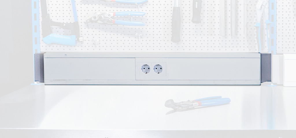 Holder with parapet channel